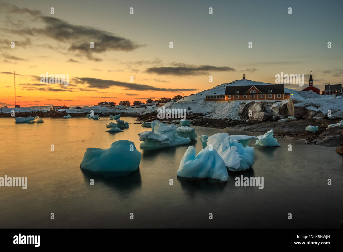 Nuuk city old harbor sunset view with icebergs, Greenland Stock Photo ...