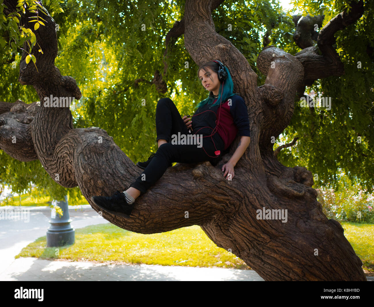 Street punk hipster girl listening hi-res stock photography and images ...