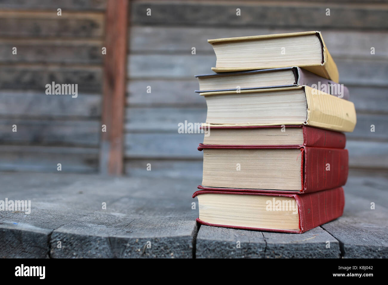 books standing on a table Stock Photo - Alamy