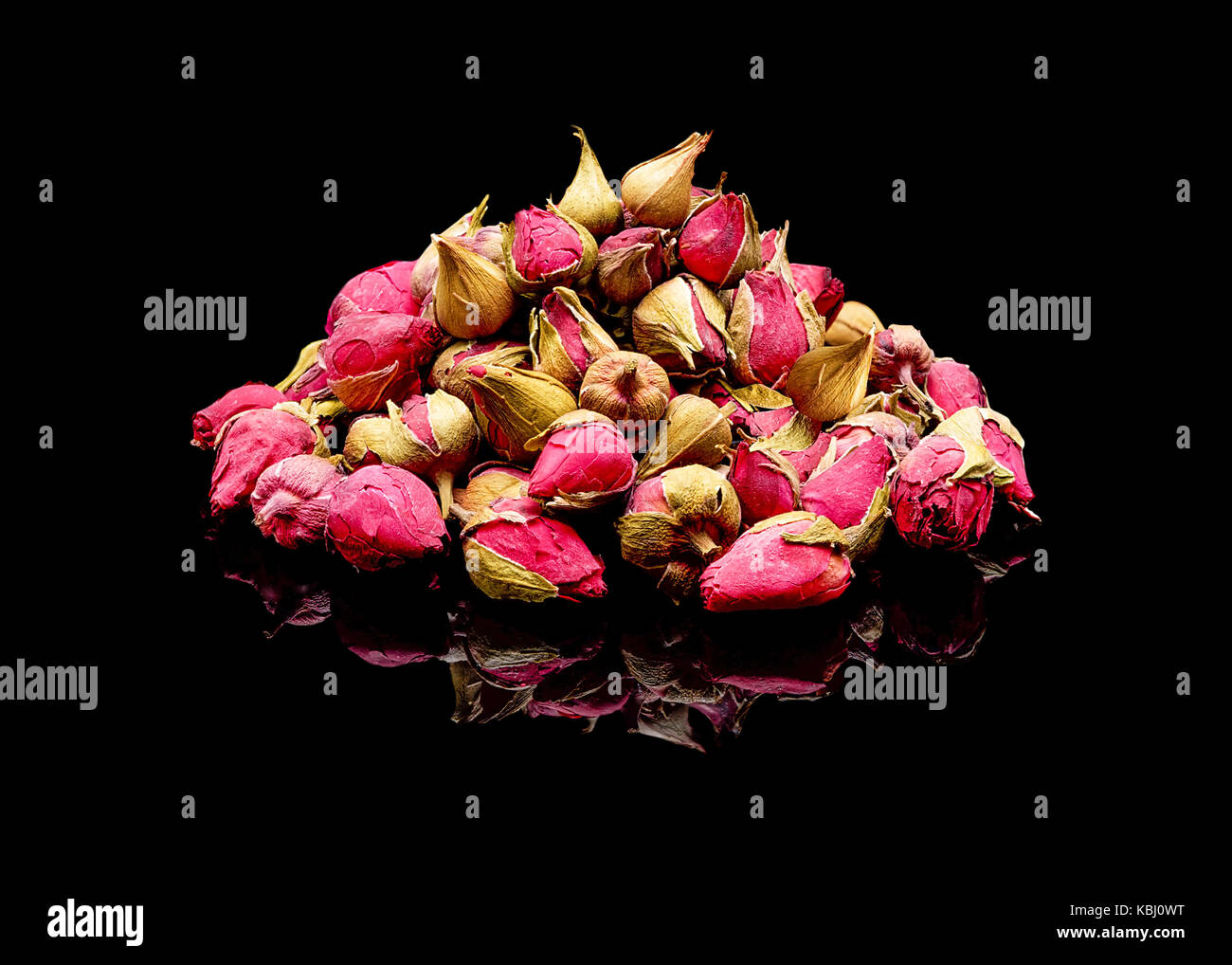 Dried red rose flower buds. Chinese tea additive for brewing. On a ...