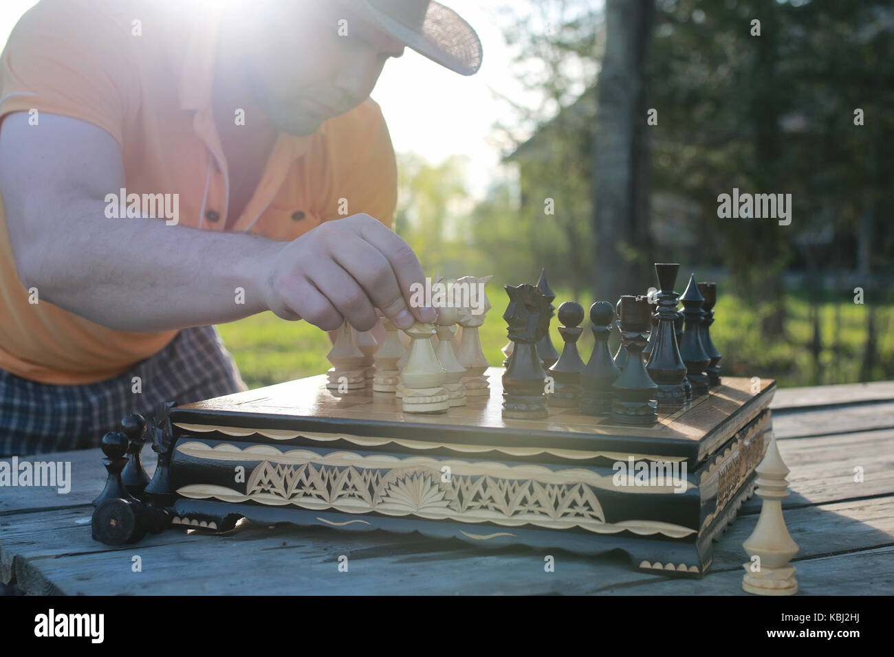 chess man hand outdoor Stock Photo - Alamy