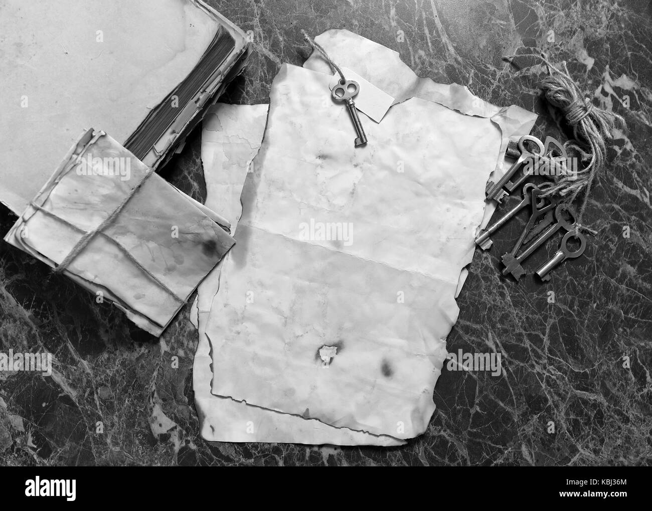 papers and book on detective work table with tools Stock Photo - Alamy