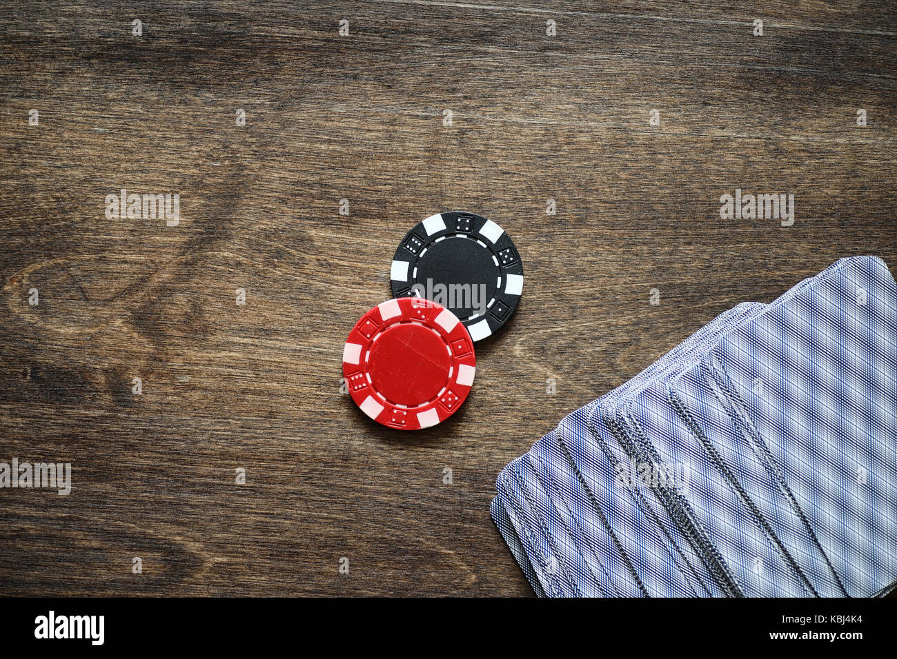 Playing chips and a deck of cards Stock Photo - Alamy
