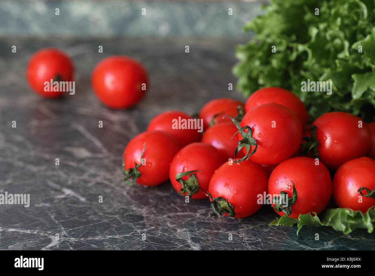 Fresh bright and juicy tomatoes on the kitchen Stock Photo - Alamy