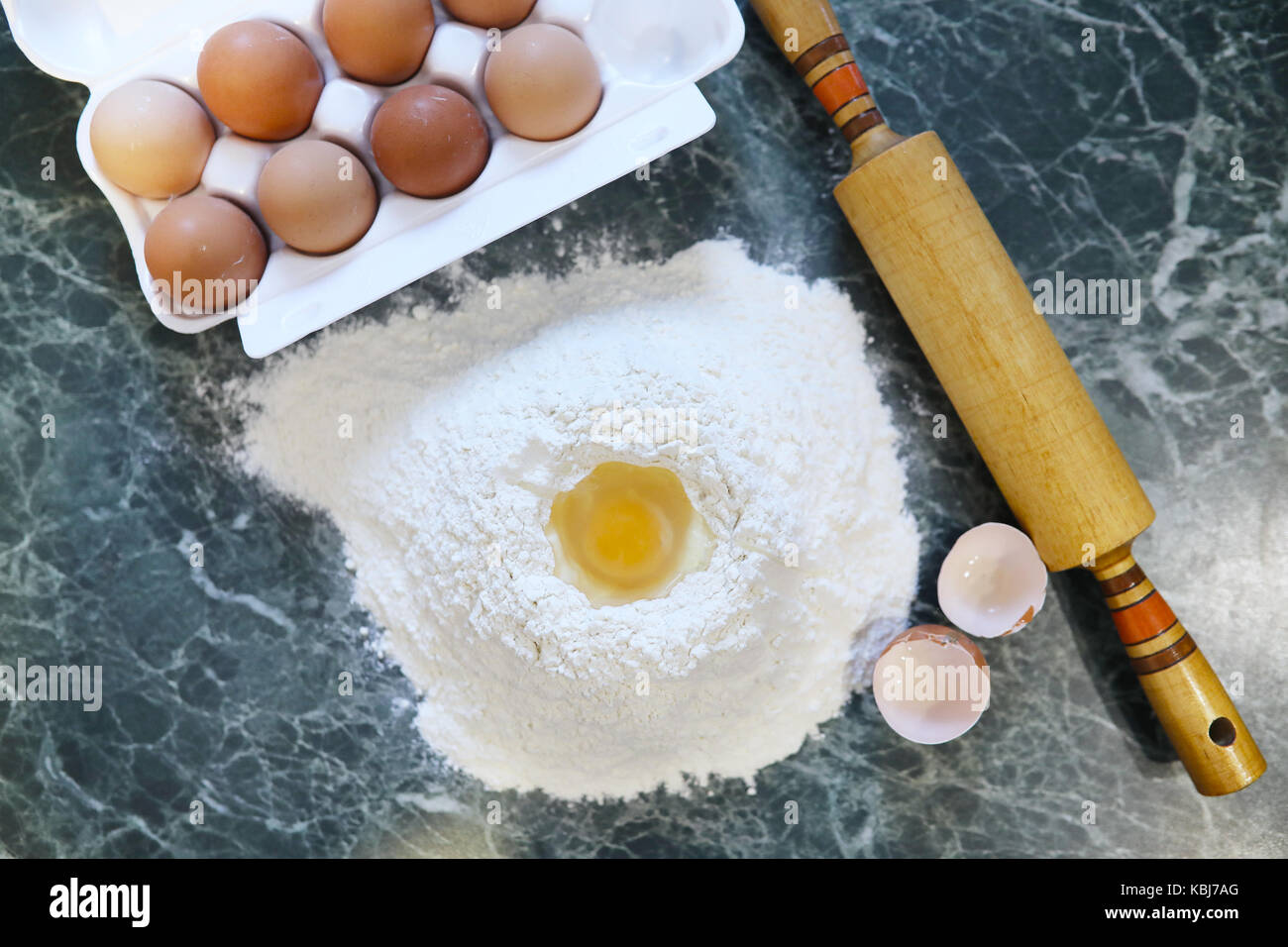 different ingredients for preparing flour products on kitchen ta Stock ...
