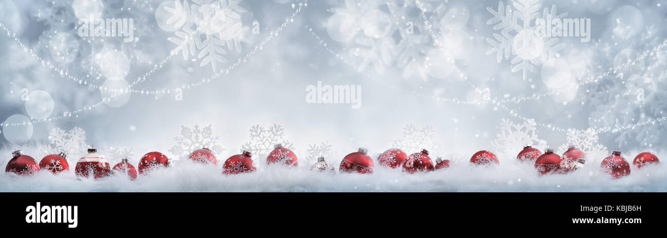 Christmas balls in winter setting Stock Photo - Alamy