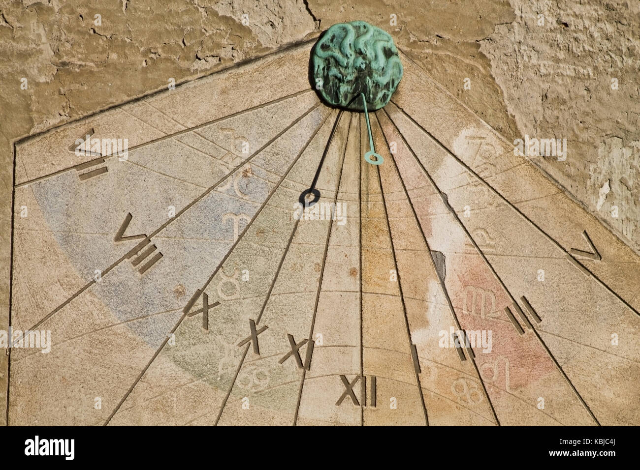 Vintage sun clock on a wall in Zagreb Stock Photo - Alamy