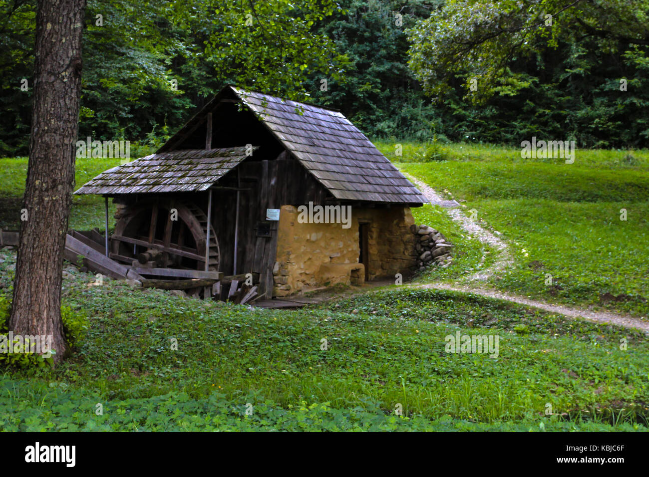 Traditional mill house in the forest woods Stock Photo - Alamy