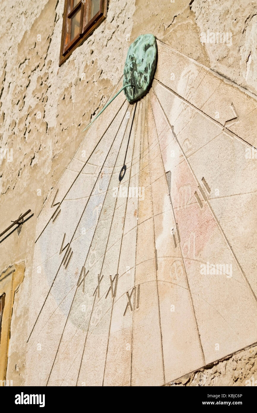 Vintage sun clock on a wall in Zagreb Stock Photo - Alamy