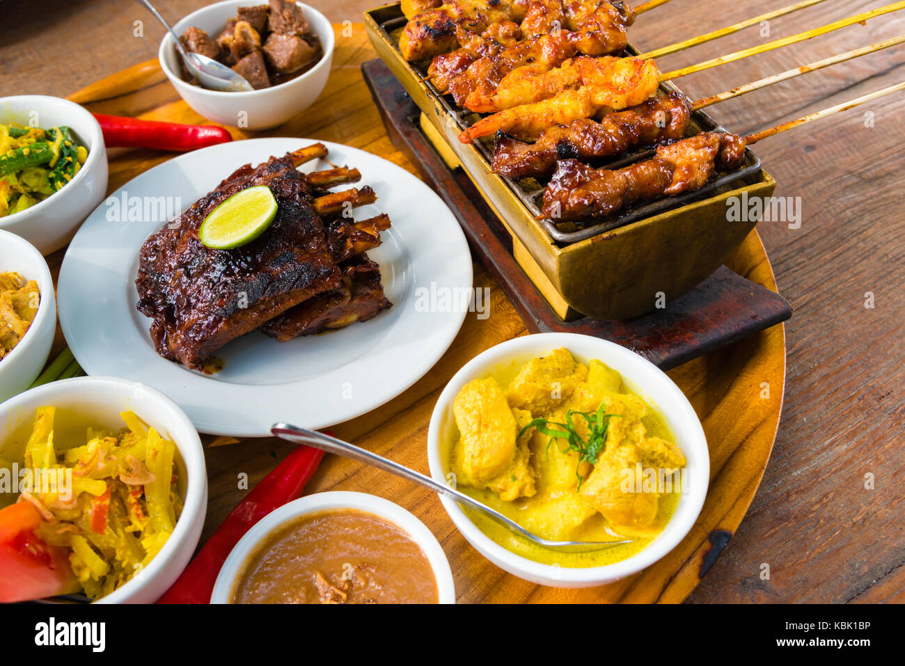 Traditional balinese sea food with satay and curry in Bali, Indonesia ...