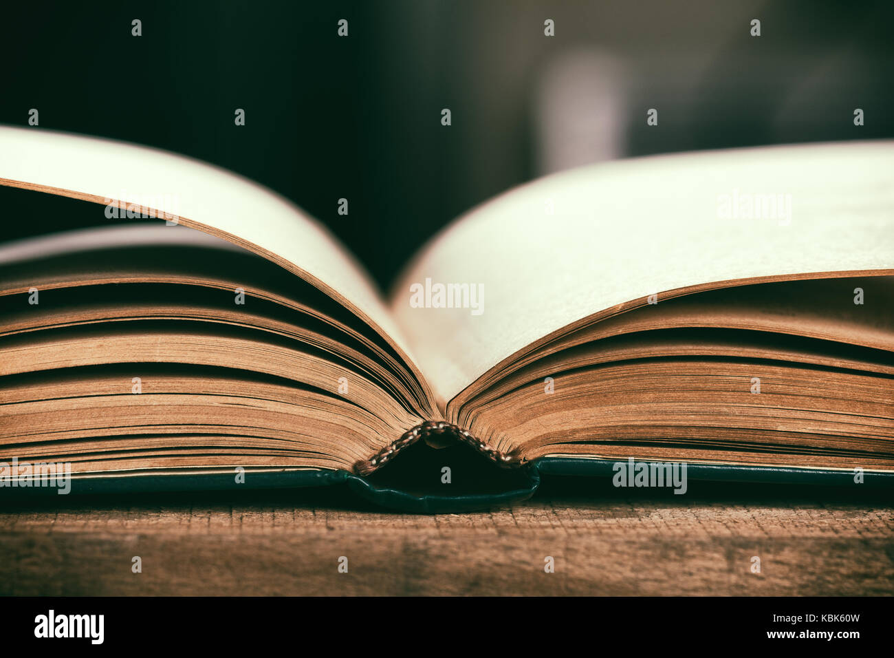 Open old book Stock Photo - Alamy