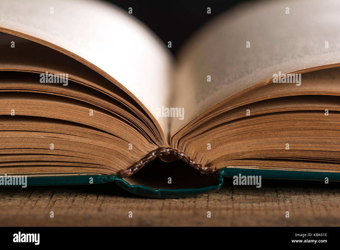 Open old book Stock Photo - Alamy