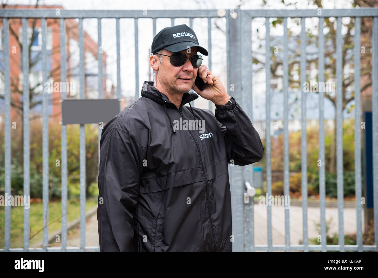 Security guard talking hi-res stock photography and images - Alamy