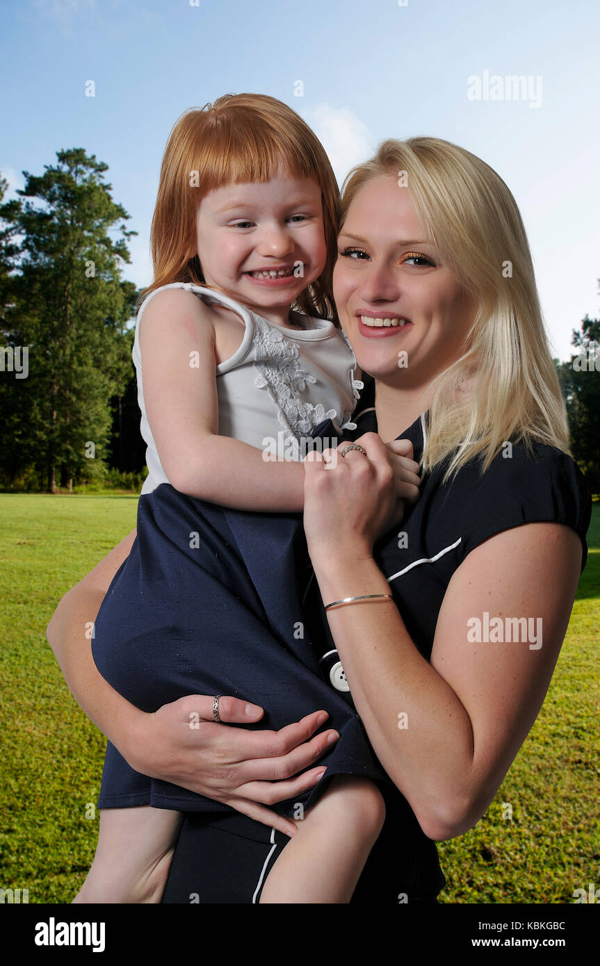 Beautiful young mother and her beautiful daughter Stock Photo - Alamy