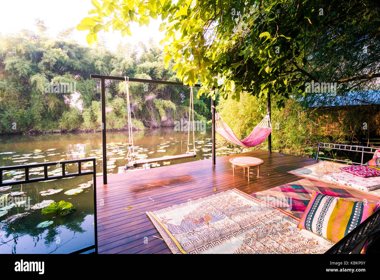 Wooden terrace under tree locate on swamp for massage Stock Photo - Alamy