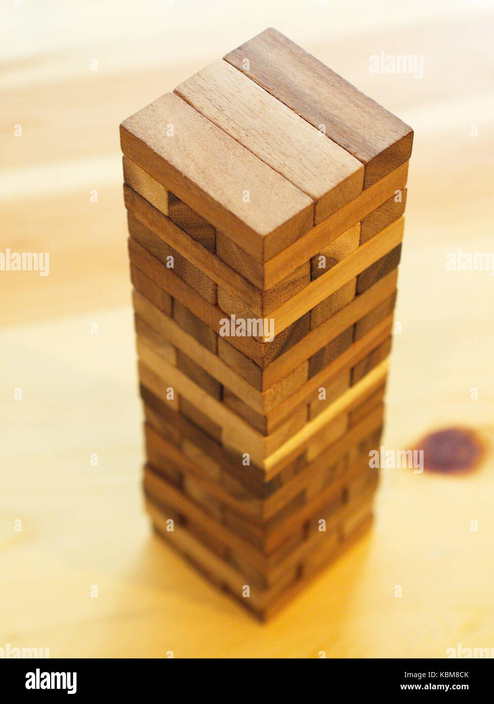 a Wooden Block Game. Wood Tower Contruction Cube Toy Stock Photo - Alamy