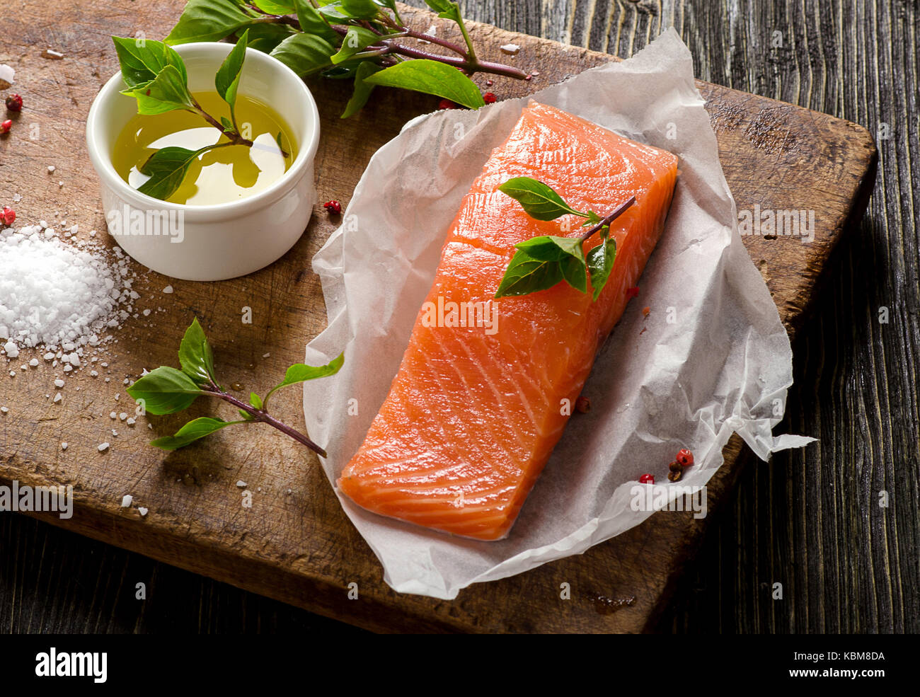 Portion of salmon fillet with herbs. View from above Stock Photo - Alamy