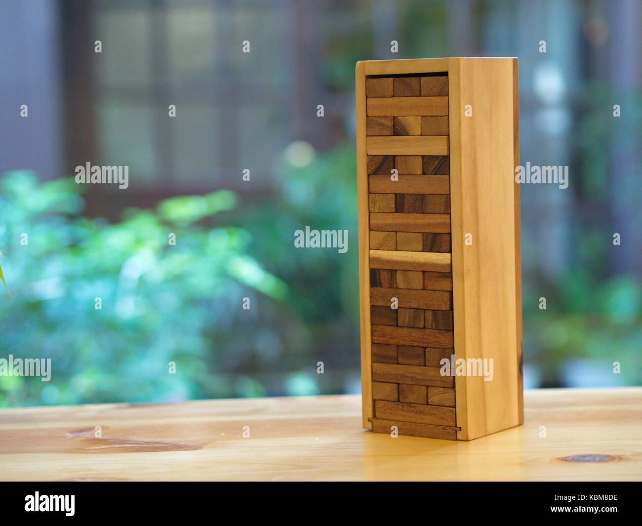 a Wooden Block Game. Wood Tower Contruction Cube Toy Stock Photo - Alamy
