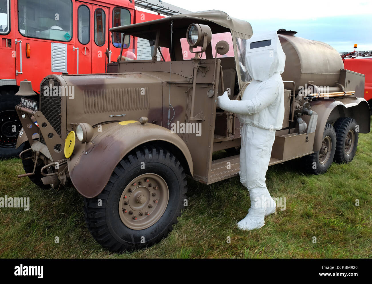 Vintage RAF fire fighing engine with dummy airman in fire resistant ...