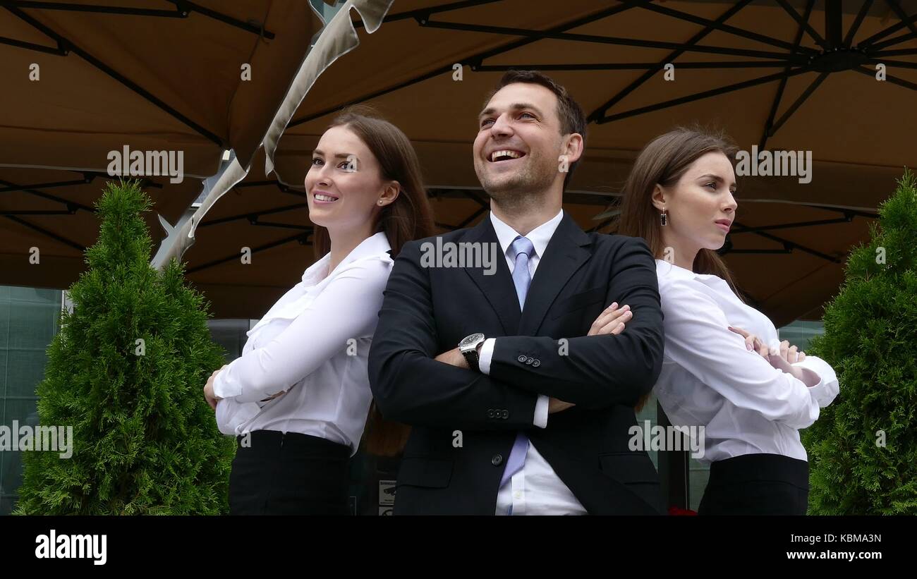 Group of confident professional managers standing in front of office ...