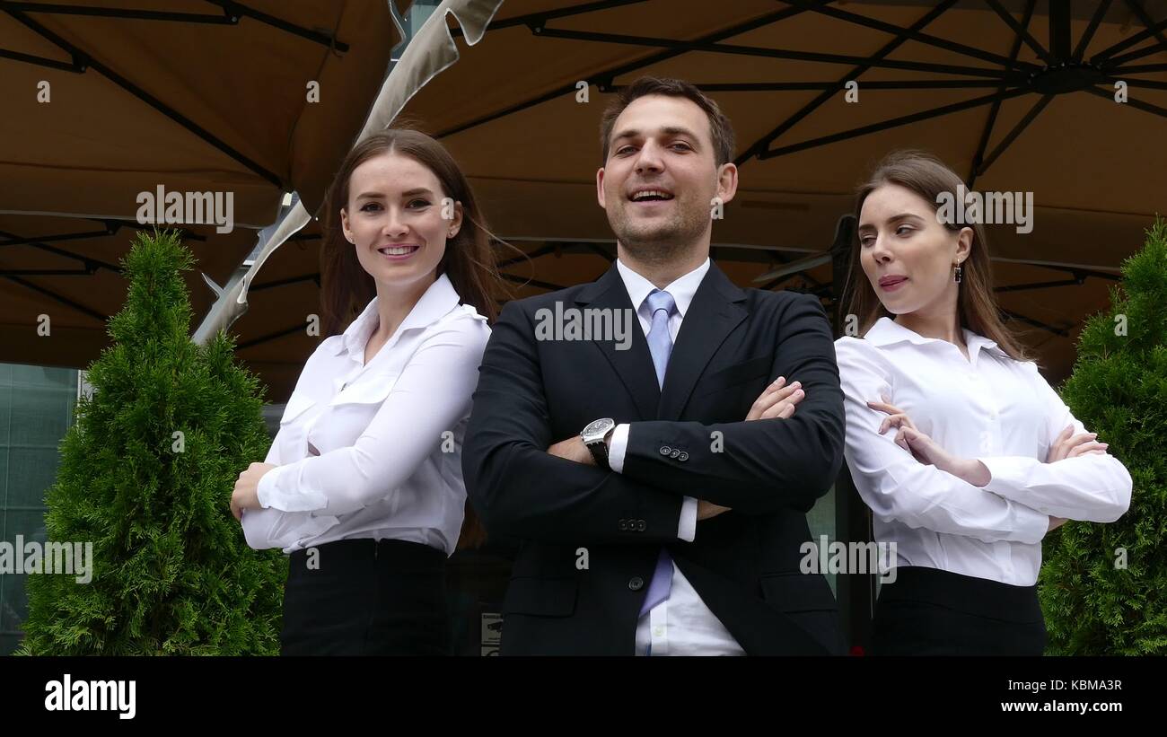 Group of confident professional managers standing in front of office ...