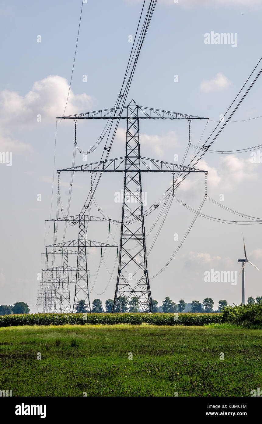 Electricity cable over the farm lands Stock Photo - Alamy