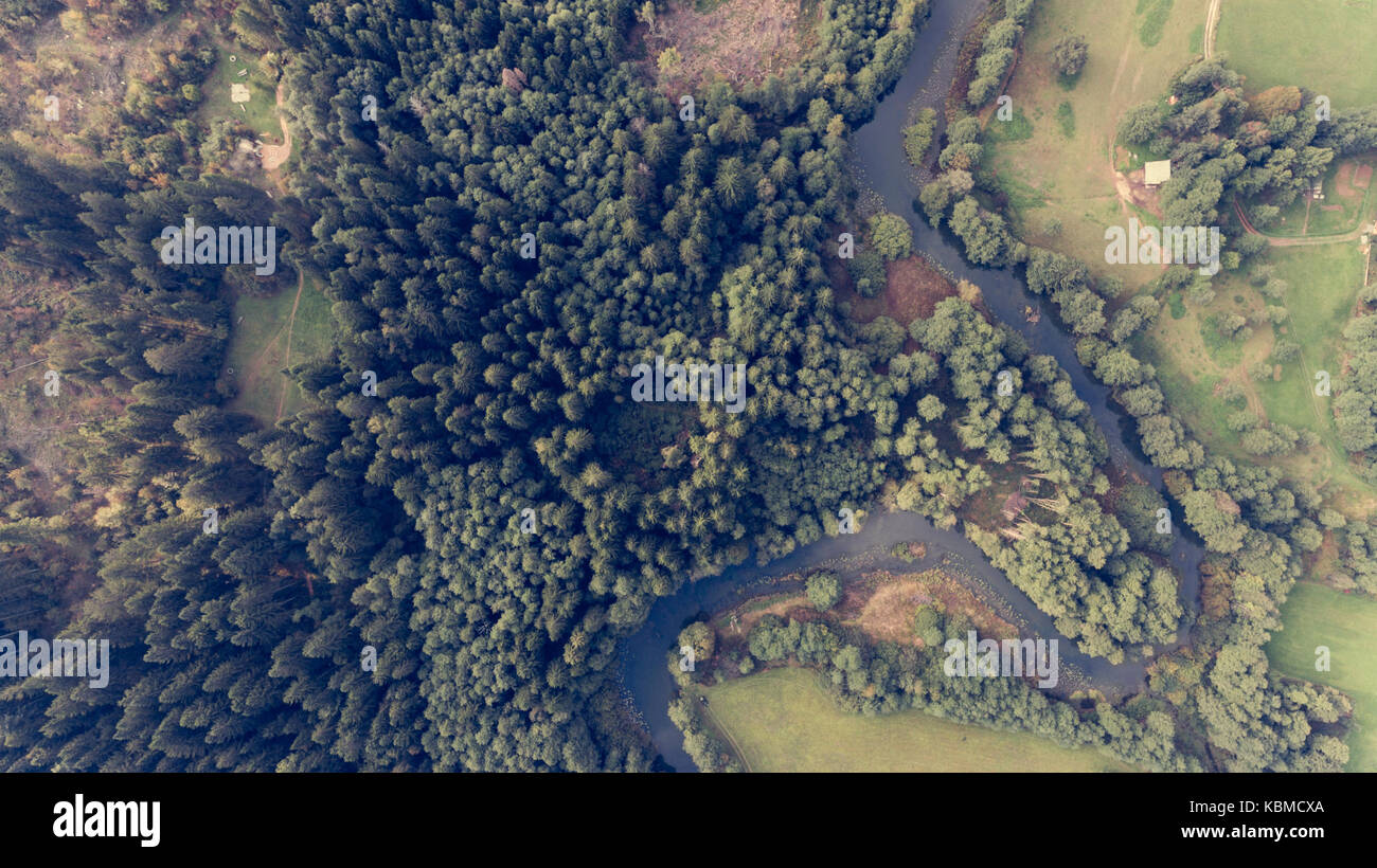 Aerial view of river bend through forest Stock Photo - Alamy