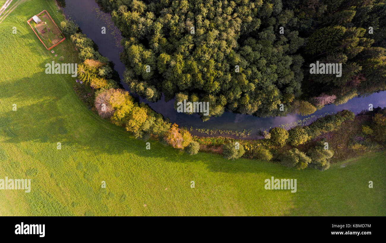 Aerial view of river bend through forest Stock Photo - Alamy