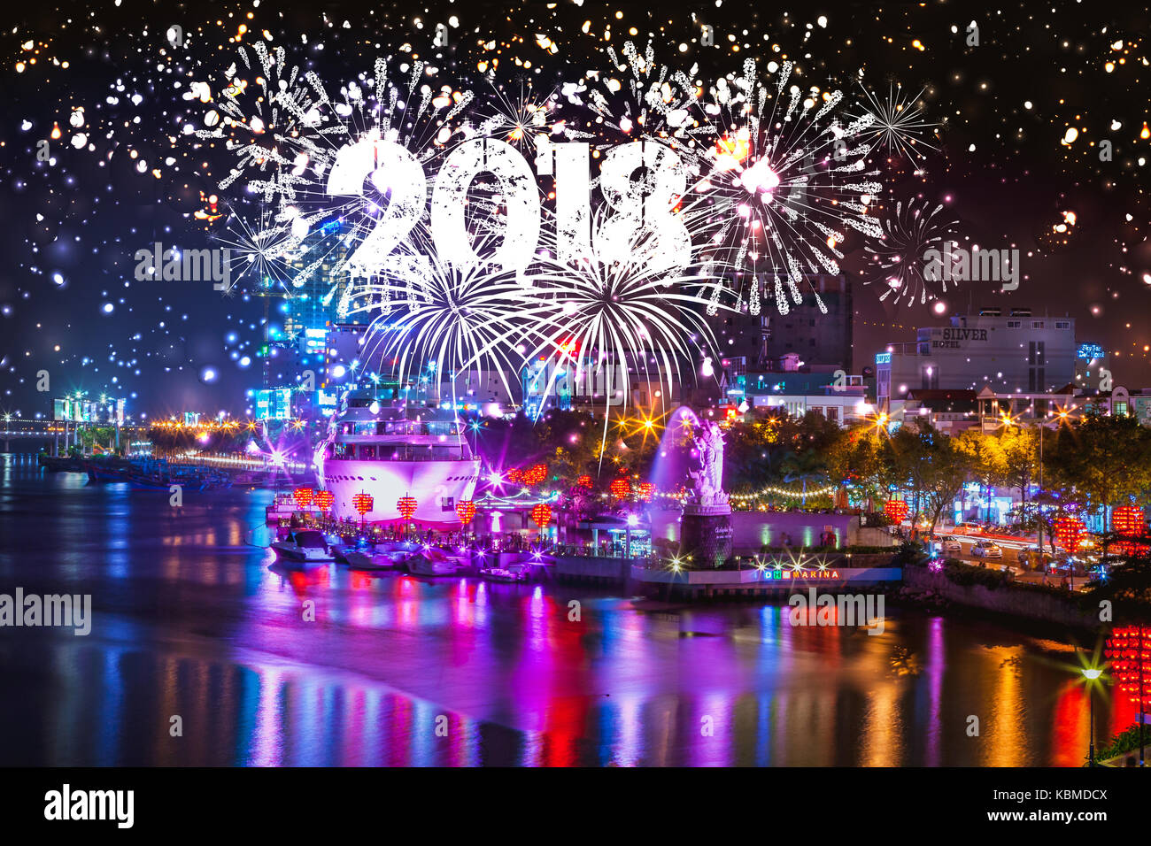 Cheerful fireworks display in city night Stock Photo - Alamy