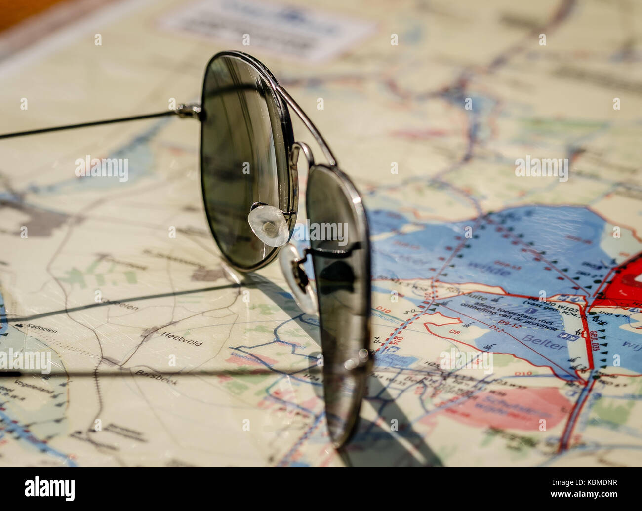 Sunglasses on a map Stock Photo - Alamy