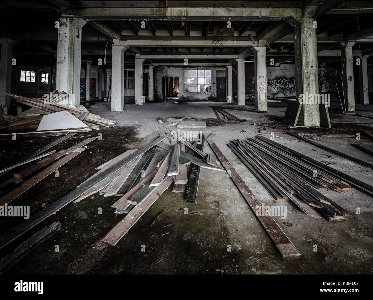 Old factory with timber on the floor Stock Photo - Alamy