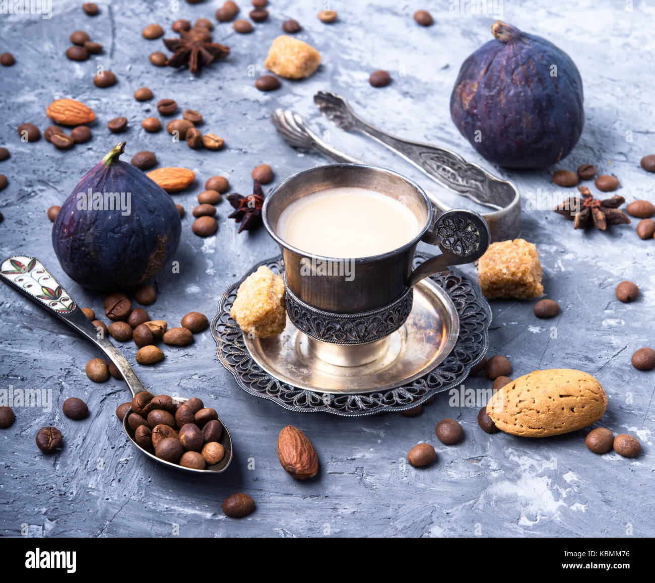 stylish metallic coffee cup on a coffee background Stock Photo - Alamy