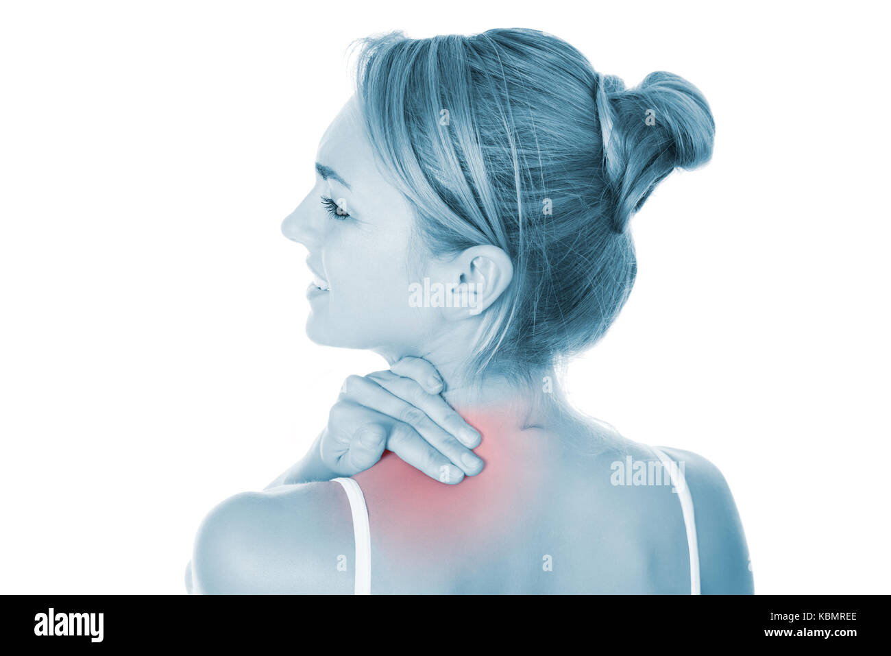 Rear view of sad young woman suffering from shoulder pain over white ...