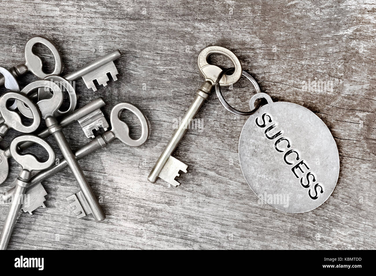 old key with success written on a ring Stock Photo - Alamy