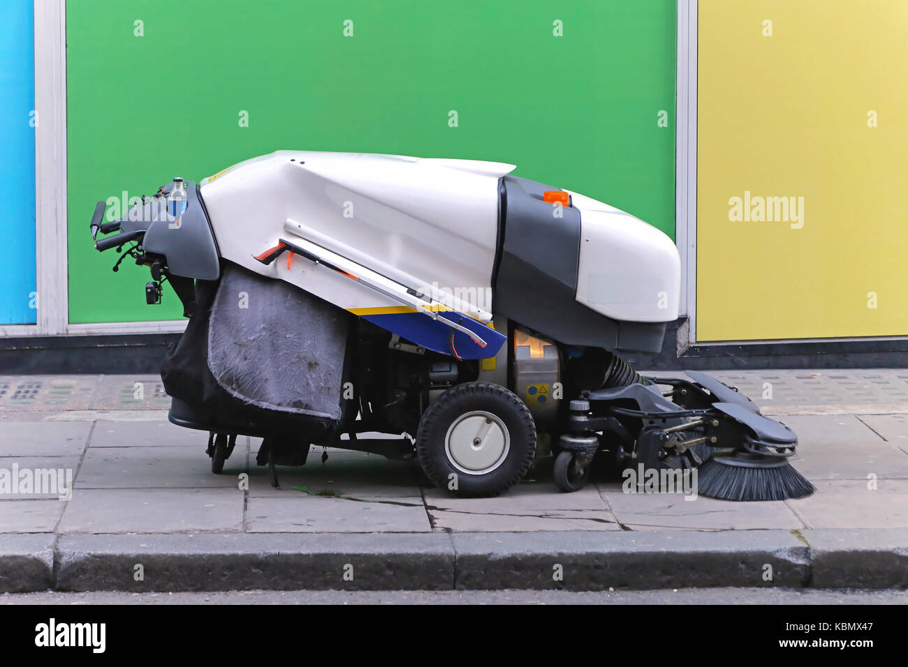Side view of street sweeping cleaner vehicle Stock Photo - Alamy
