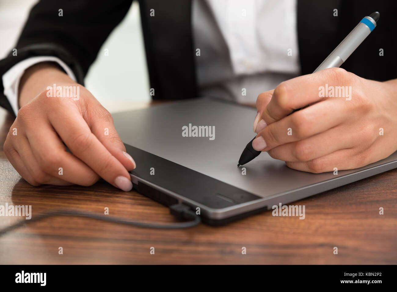 Close-up Of Person Hand Drawing On Digital Graphic Tablet With Pen ...