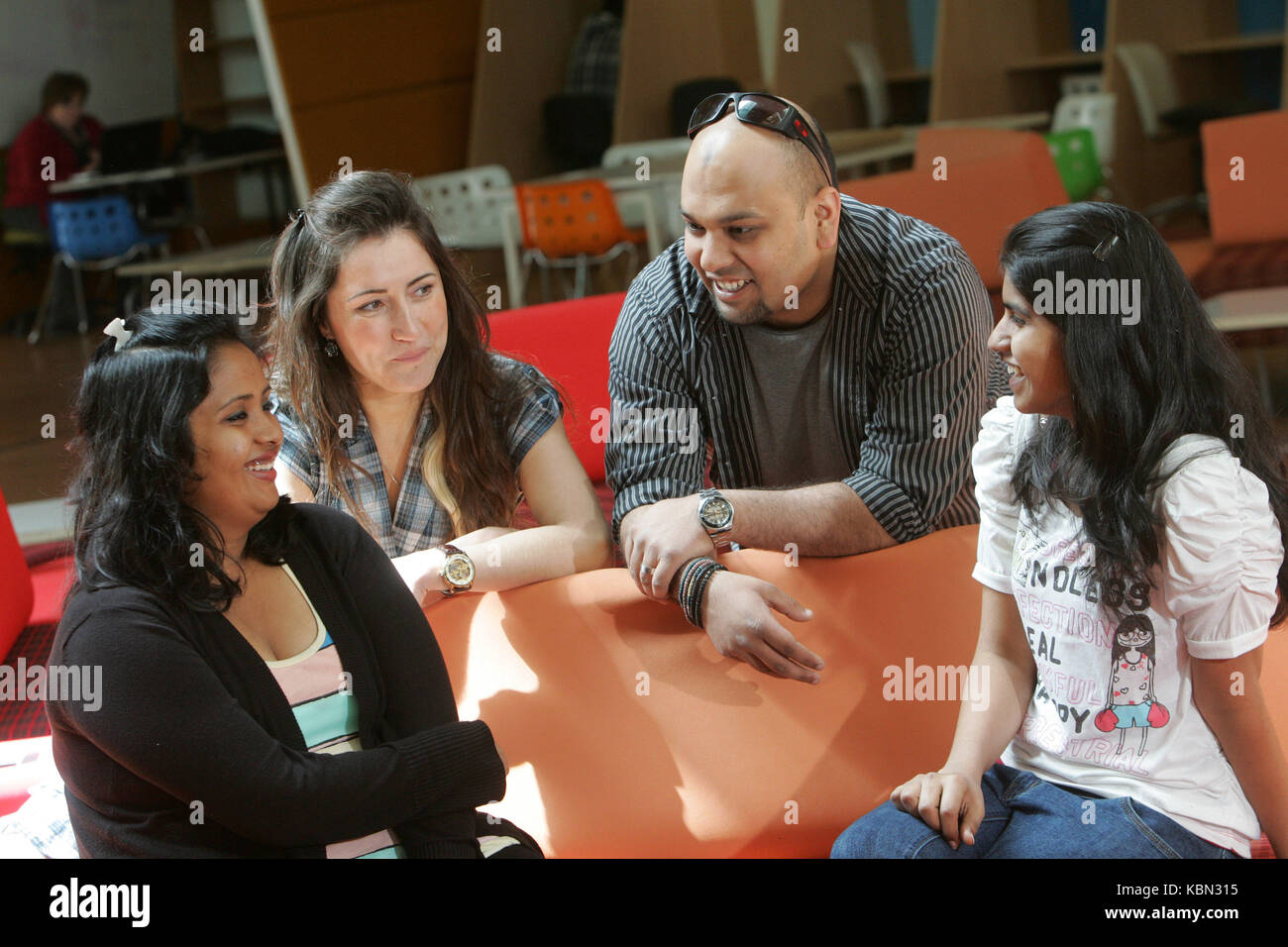 University students talking on campus hi-res stock photography and ...