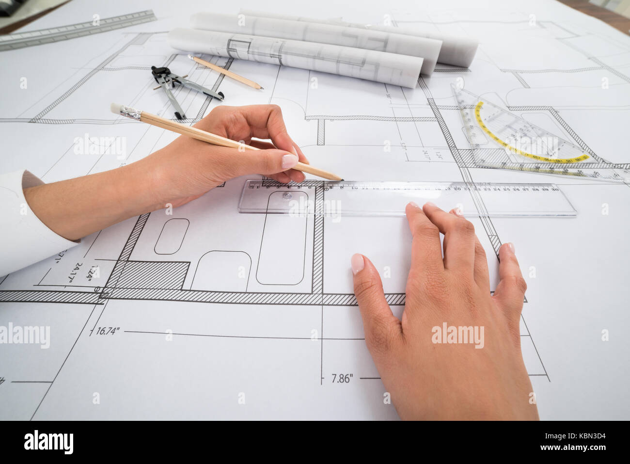 Close-up Of Architect Hands Working On A Blueprint In Office ...
