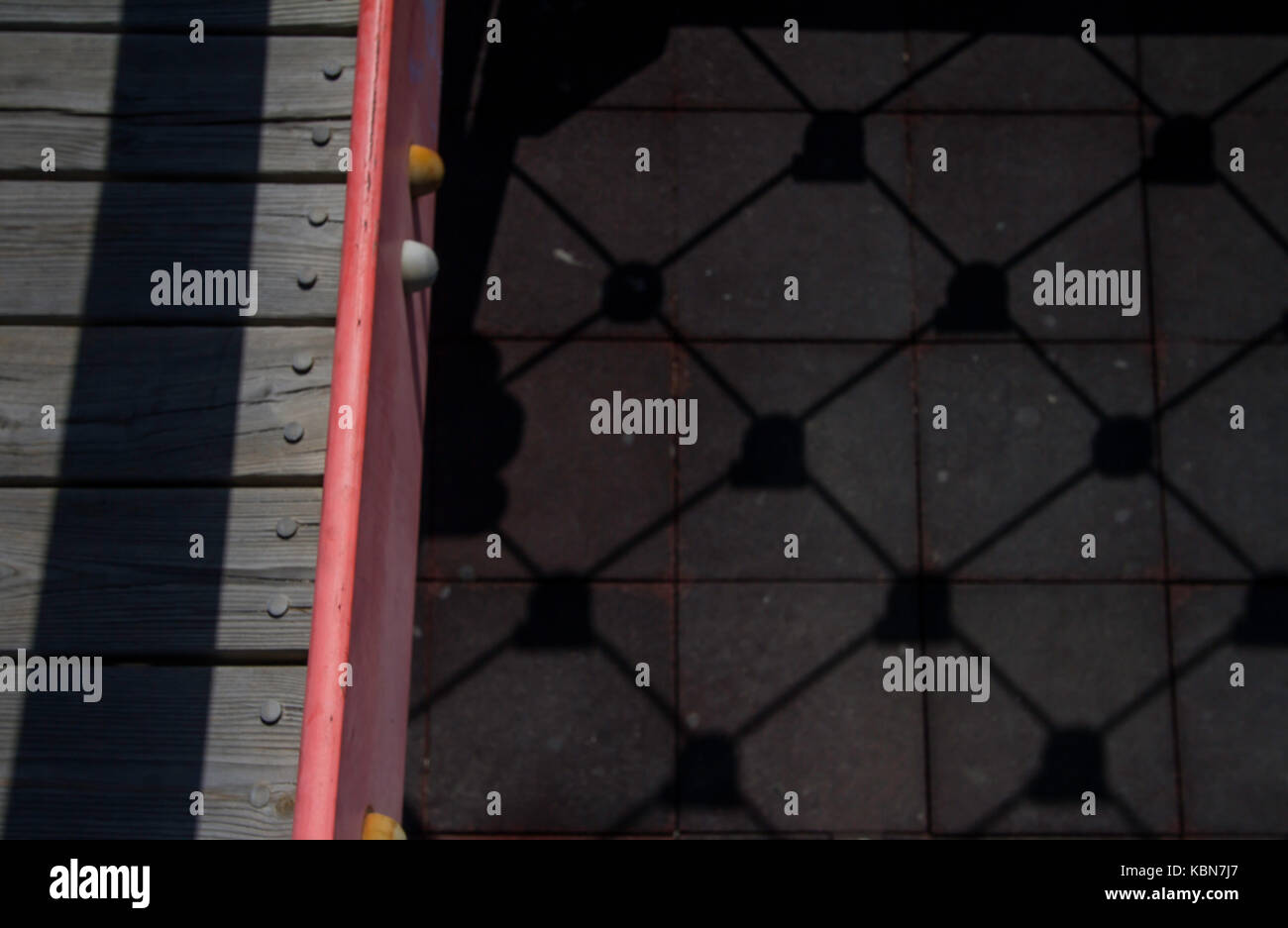 Textures and shadows in a Childs playground Stock Photo - Alamy