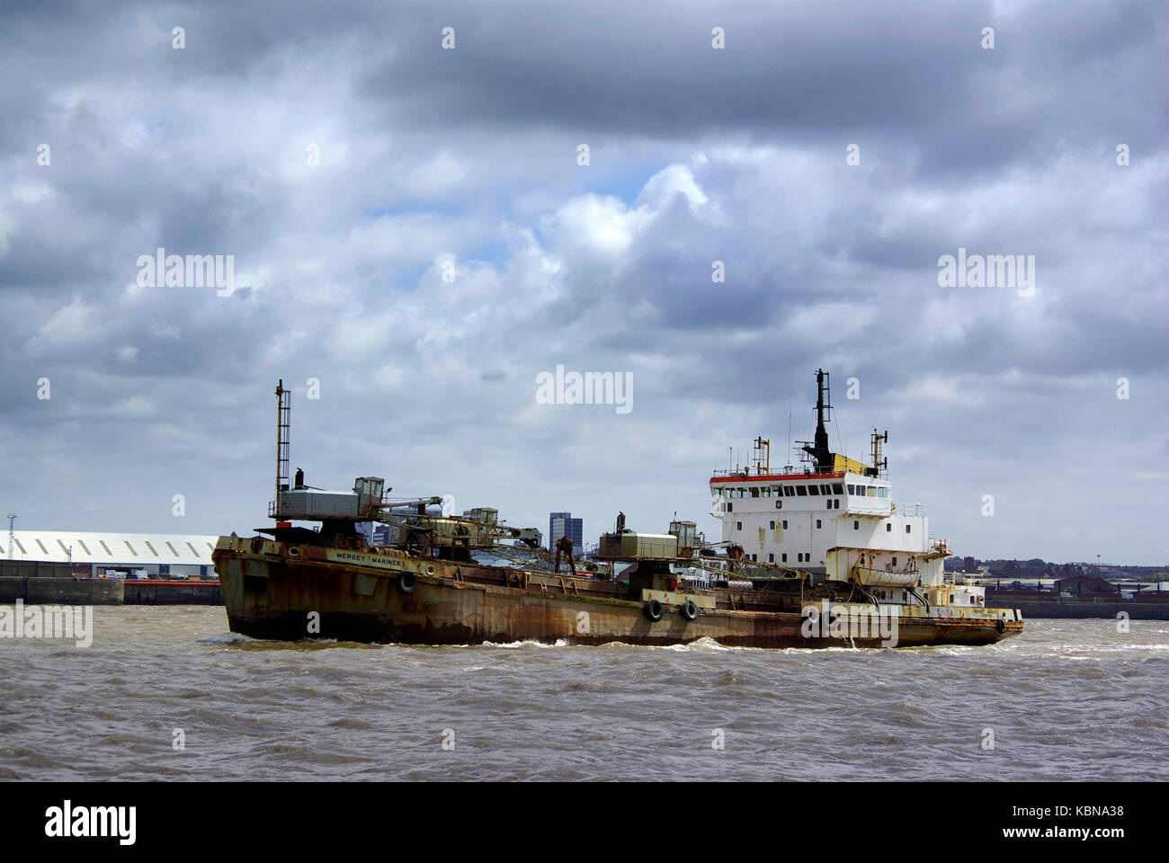 Dredger on river Mersey Stock Photo - Alamy