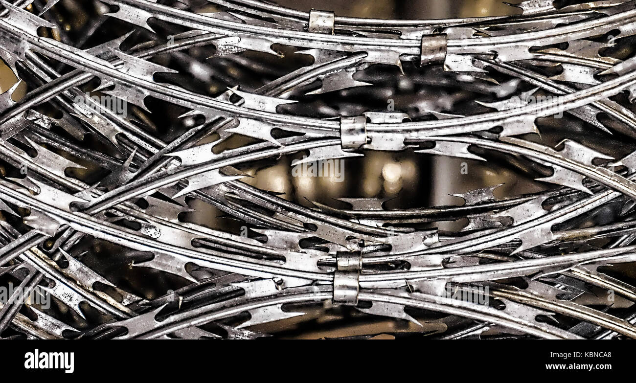 Close up of barbwire, razor wire Stock Photo - Alamy