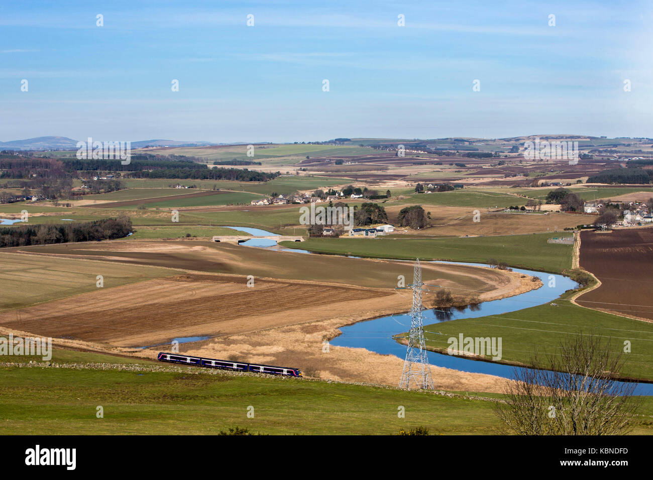Scottish train travelling through countryside outside Inverness Stock ...