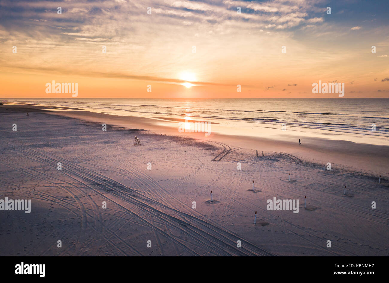 Sunrise over the ocean and wide beach aerial view Stock Photo - Alamy