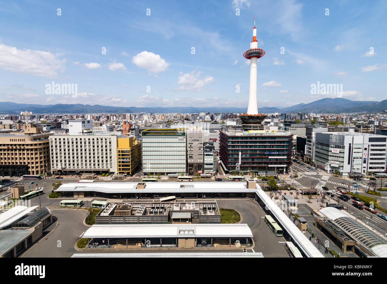 Japan, Kyoto. The Kyoto tower and tower hotel with station bus terminus ...