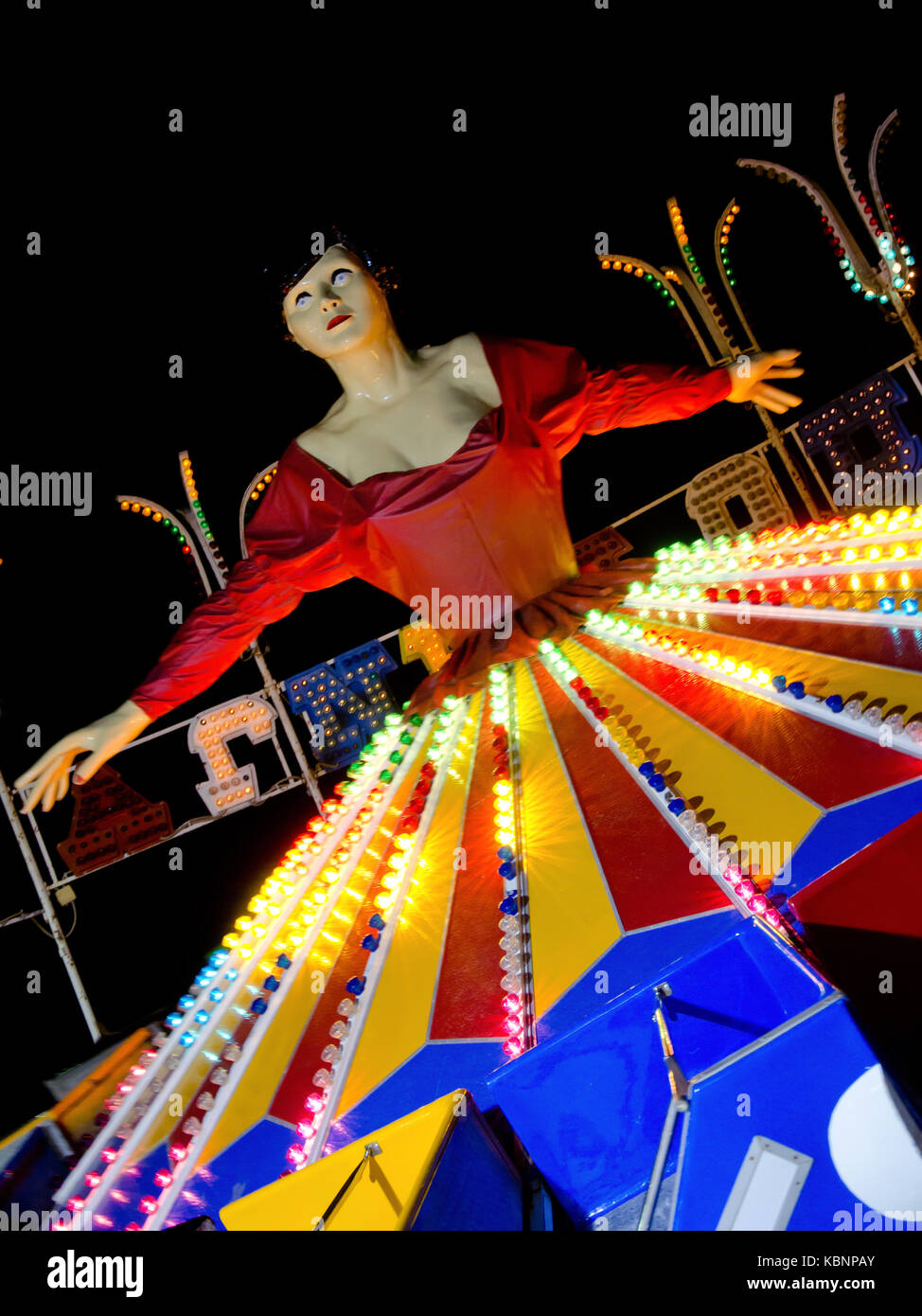 ballerina at amusement park by night Stock Photo - Alamy
