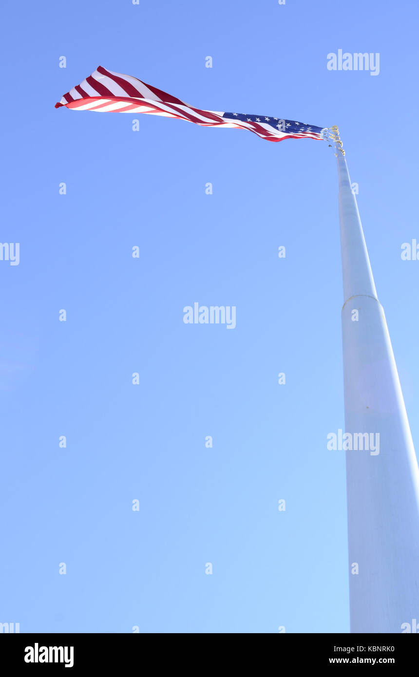 American flag blowing in wind Stock Photo - Alamy