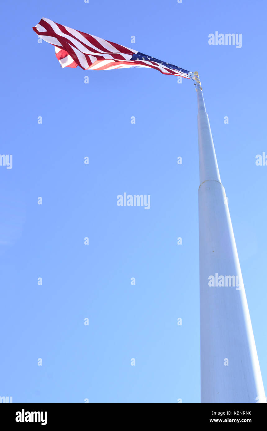 American flag blowing in wind Stock Photo - Alamy