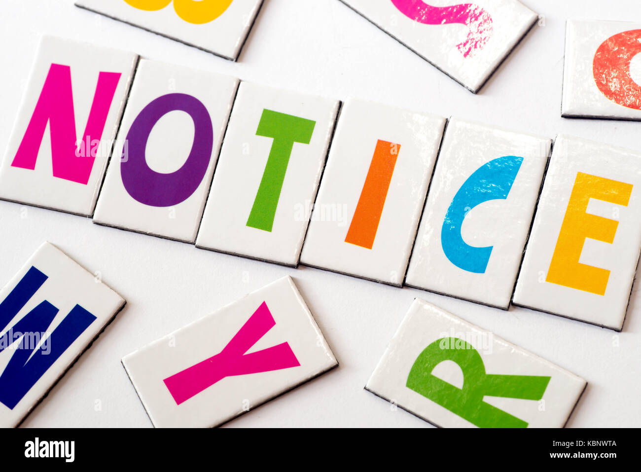 word notice made of colorful letters on white background Stock Photo ...