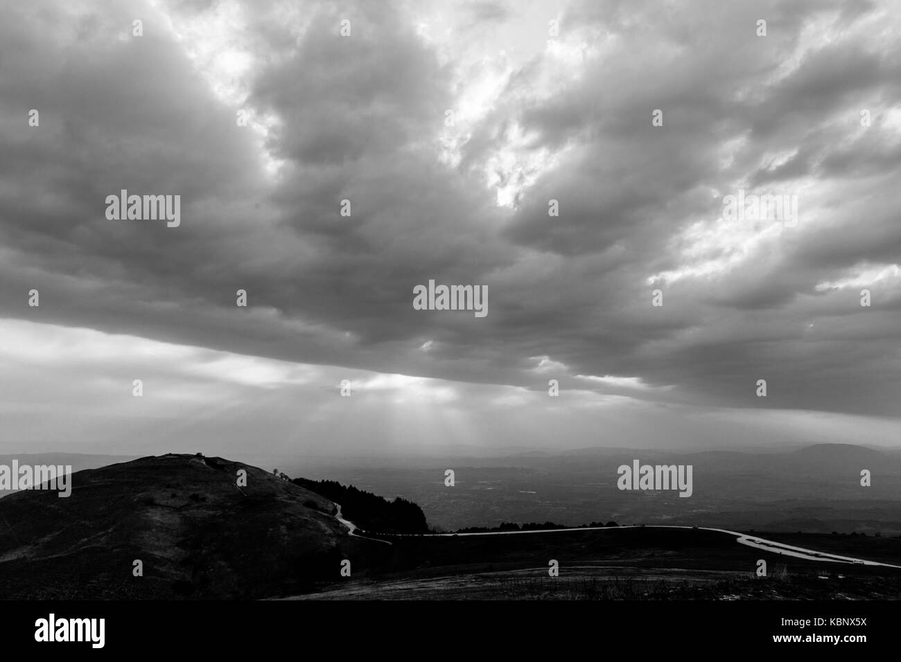 Clouds view sun rays Black and White Stock Photos & Images - Alamy
