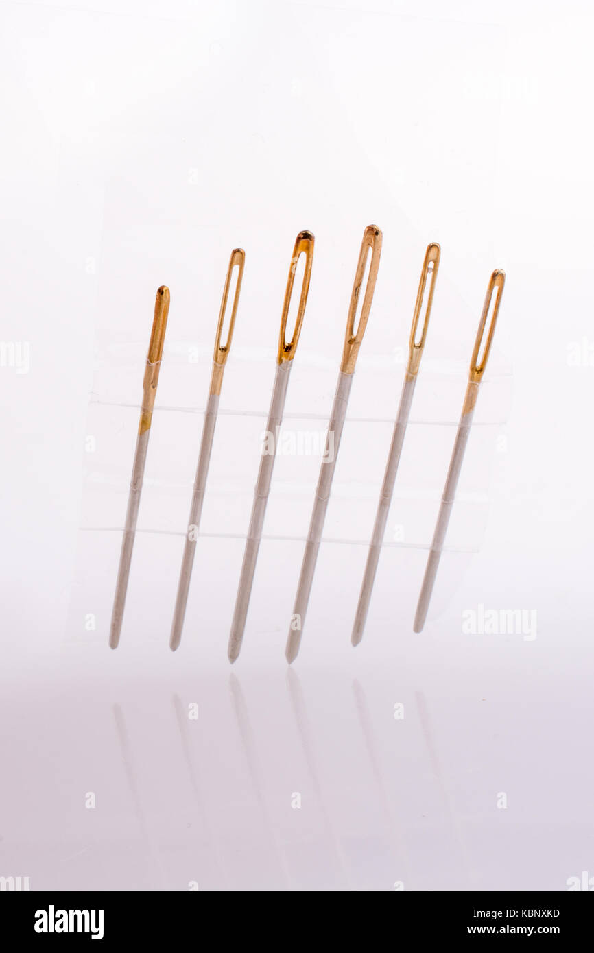 Six different sewing needles isolated on a white background Stock Photo ...